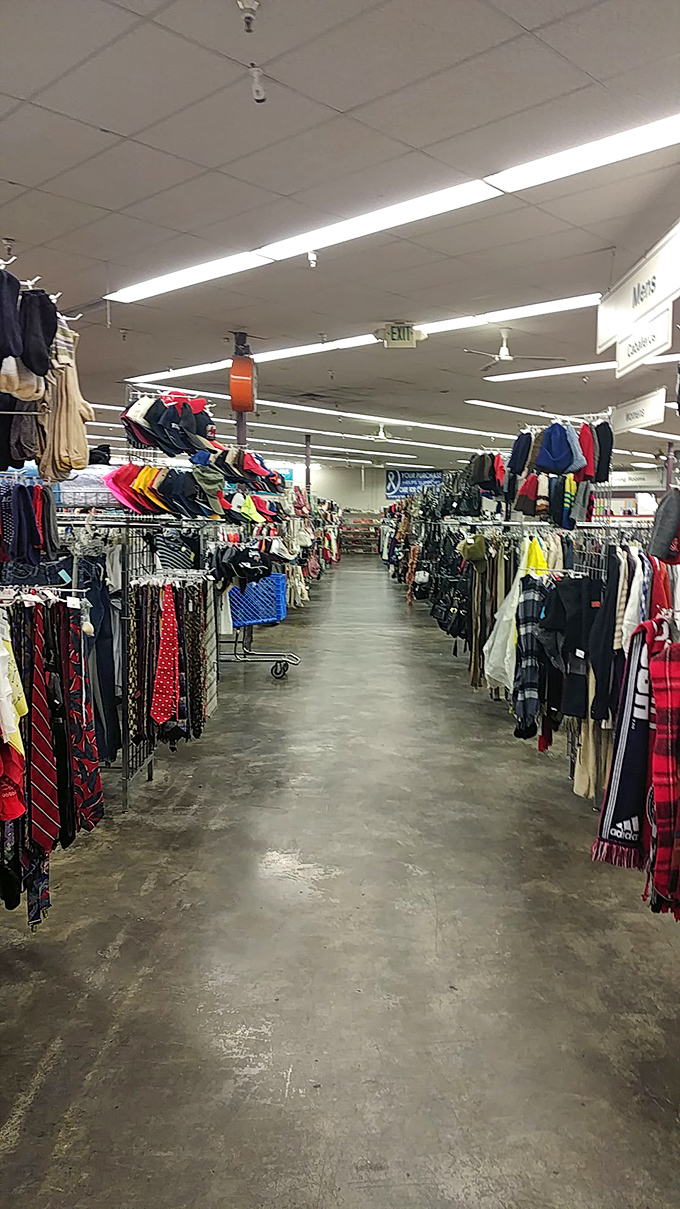 Endless racks create a textile landscape that would make even the most seasoned thrifter's heart skip a beat. The treasure hunt begins!