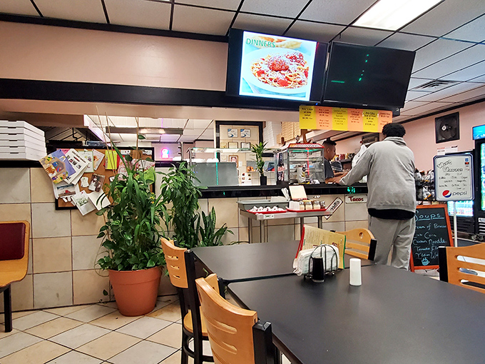 Potted plants add homey touches to Gabriel's no-frills interior. This isn't about fancy decor&mdash;it's about the serious business of feeding people well.