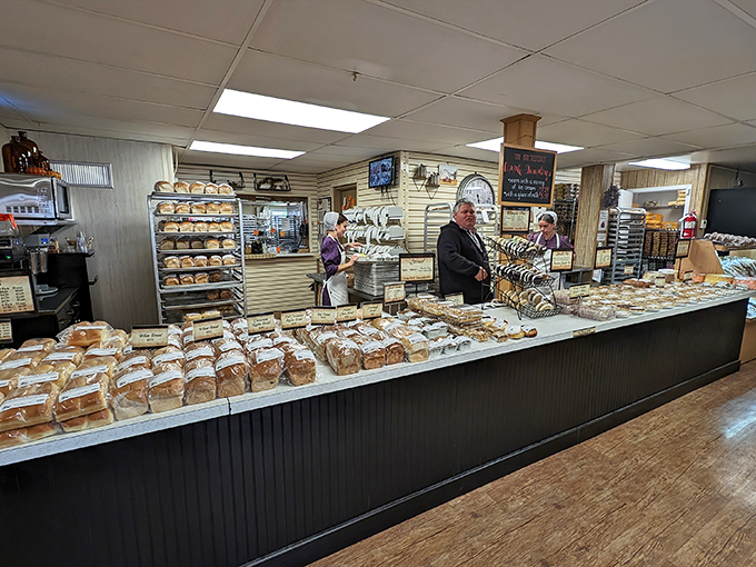 Bread heaven awaits! The bakery counter stretches like a carbohydrate runway, showcasing loaves that make store-bought bread seem like a sad, distant relative.