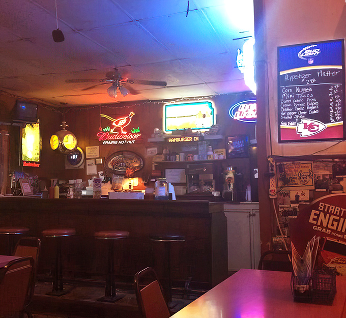 Step inside to a world where neon beer signs provide the ambiance and Chiefs memorabilia tells you you're in Kansas. This bar isn't trying to impress anyone, which is precisely why it does.