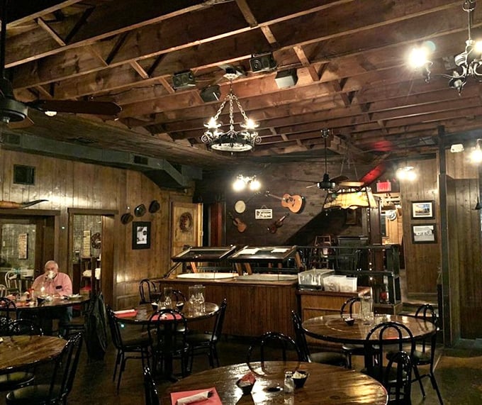 Rustic wooden beams and warm lighting create the perfect atmosphere for serious eating. It's like dining in a cozy cabin where calories don't count.