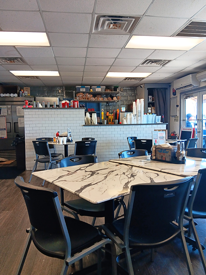 Inside, simplicity reigns supreme with marble-topped tables and subway tile. This isn't about the d&eacute;cor&mdash;it's about clearing the stage for the real star: the food.