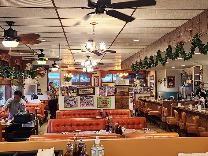 Those orange vinyl booths have absorbed more coffee talk and life stories than a therapist's notebook ever could.