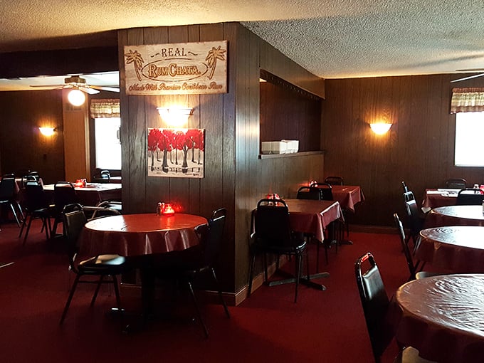 Classic supper club ambiance with wood paneling and red tablecloths&mdash;where time slows down and conversations flow as smoothly as the cocktails.