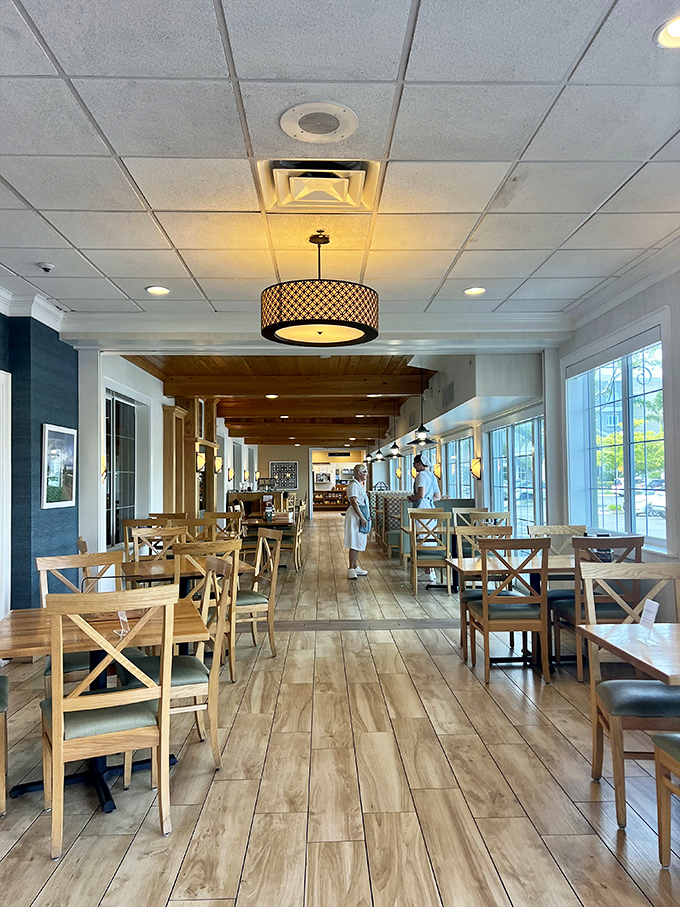 Warm wood tones and thoughtful lighting create a dining space that invites you to slow down and savor every bite.