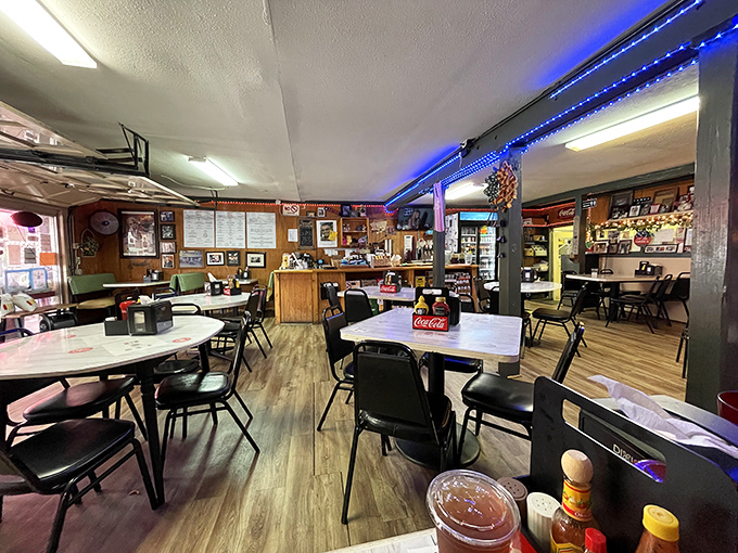 Step inside where neon lights meet nostalgia, and every table has witnessed countless burger-induced epiphanies over the years.