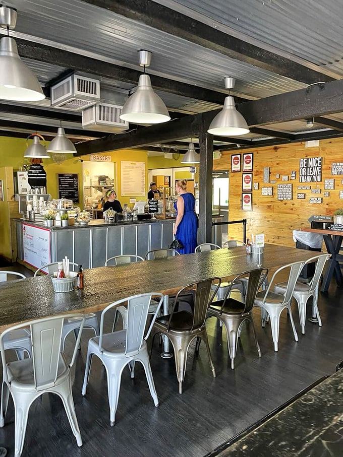 Industrial meets homey in this bright space where metal chairs, wooden tables, and "Be Nice or Leave" signs create the perfect backdrop for serious comfort food indulgence.