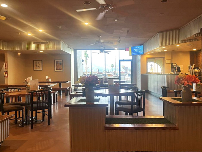 Inside, corrugated metal accents and warm lighting create that perfect balance of rustic charm and comfortable dining &ndash; BBQ's natural habitat.