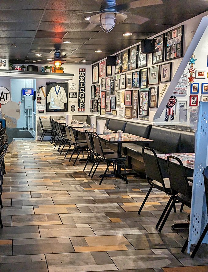 Wall-to-wall memories and memorabilia create the perfect backdrop for breakfast bliss. This isn't decoration&mdash;it's a community scrapbook with tables.