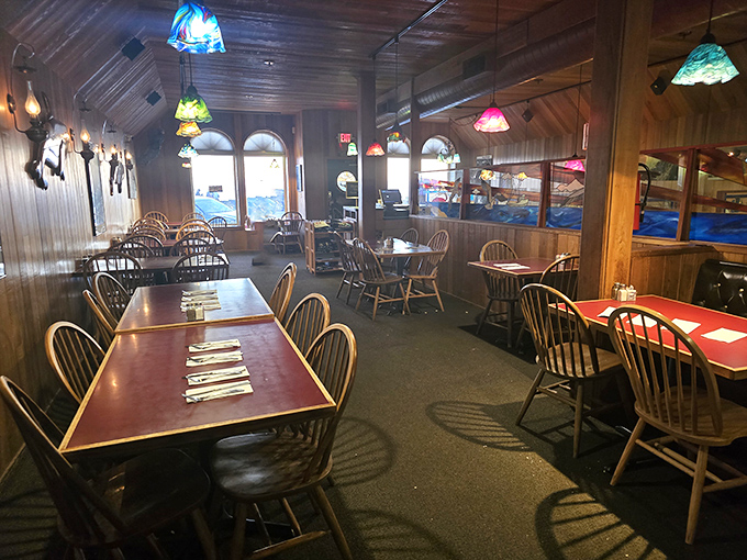 Wooden paneling and colorful stained-glass lamps create that perfect "come as you are" atmosphere where memorable meals and conversations naturally flow.