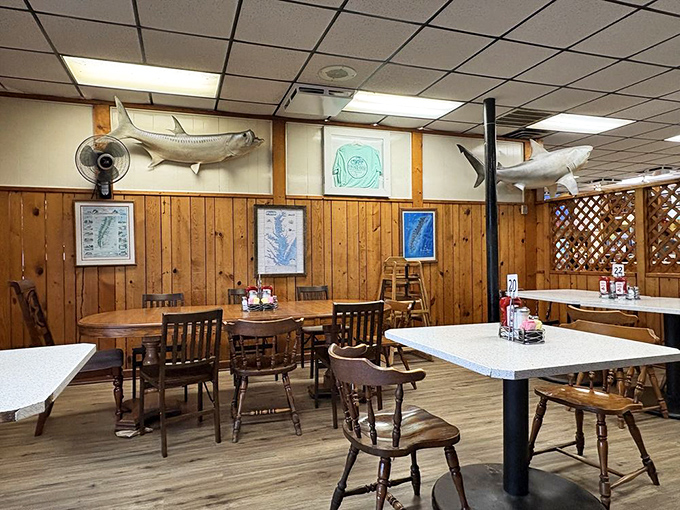 Wooden paneling and mounted fish tell you everything you need to know: authenticity lives here, and so do really good meals.