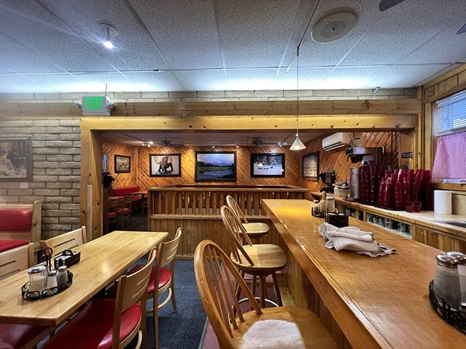 Step into this cozy dining room where rustic wood meets comfort food, and suddenly nowhere else matters today. 
