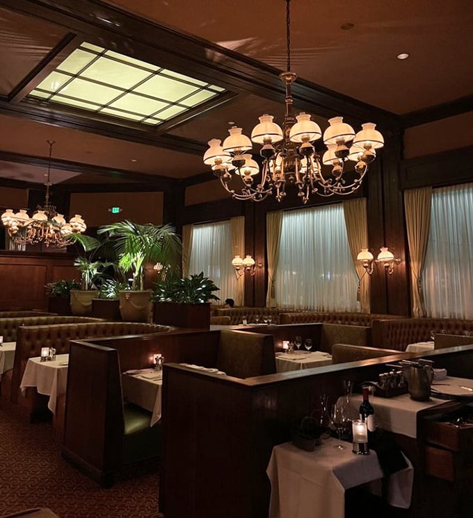 Step inside and time slows down &ndash; elegant chandeliers, leather booths, and that perfect amber lighting that makes everyone look like they're starring in their own classic film.