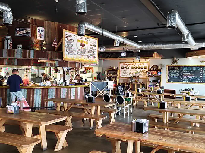 Blue checkered tablecloths and a checkerboard floor create the perfect backdrop for morning conversations and coffee refills that never seem to end.