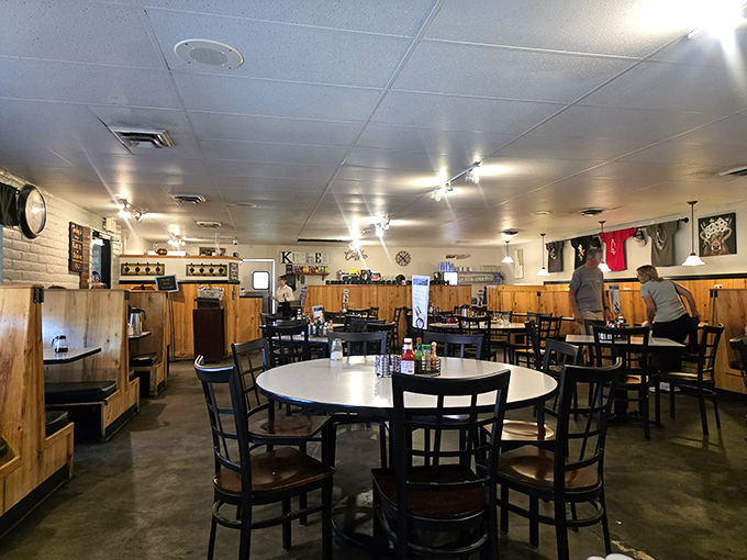 Wooden paneling and simple furnishings create that classic diner atmosphere where comfort trumps pretension. This is where memories are made over maple syrup.
