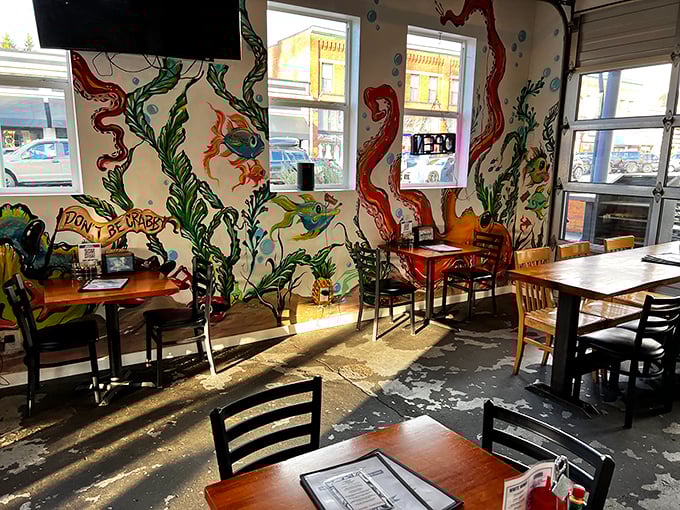 The underwater mural transforms dining into an oceanic adventure. Like eating inside an aquarium, minus having to make eye contact with your dinner.