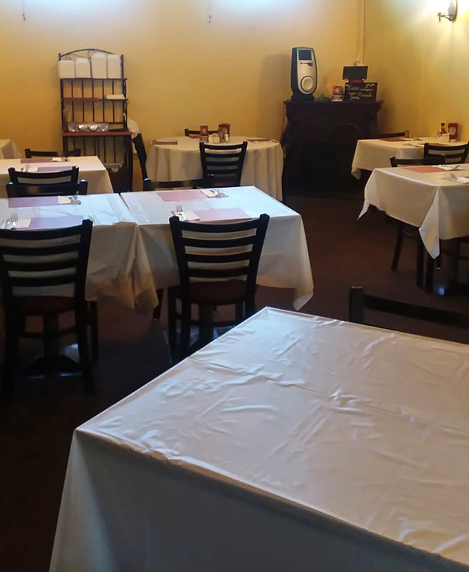 Simple white tablecloths and no-nonsense chairs set the stage for serious eating&mdash;this dining room isn't about the decor, it's about the food.