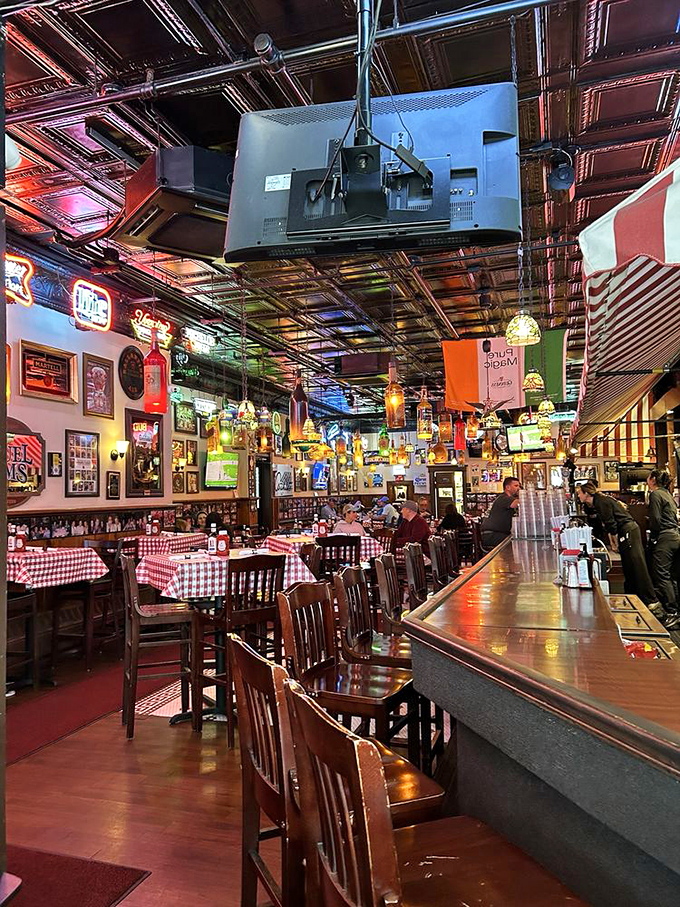 Step inside and the neon glow, checkered tablecloths, and pressed tin ceiling transport you to a time when restaurants didn't need influencers &ndash; just incredible food.