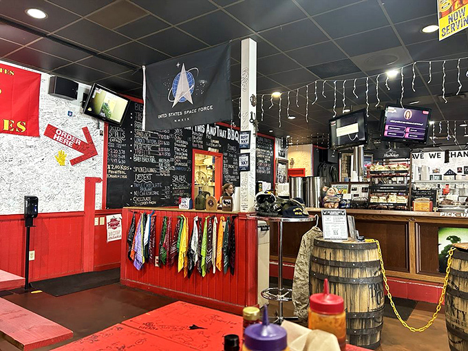 Military memorabilia and a Space Force flag share space with the legendary menu board. This isn't just a restaurant&mdash;it's a community gathering place.