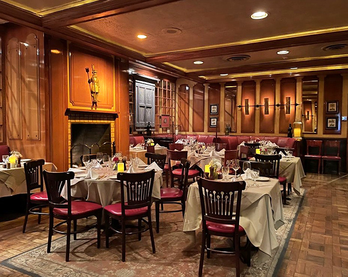 Step inside and time travel to an era when dining rooms had character. Rich wood paneling, white tablecloths, and that unmistakable steakhouse glow.