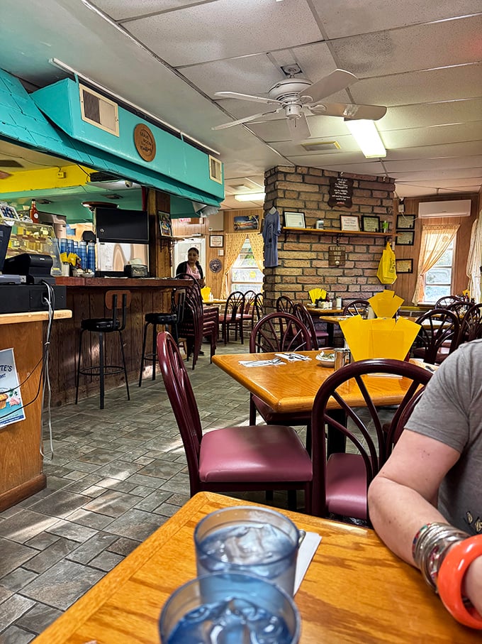 Inside Harriette's, time slows down as ceiling fans lazily spin above wooden tables where countless vacation memories have been made over steaming coffee cups.