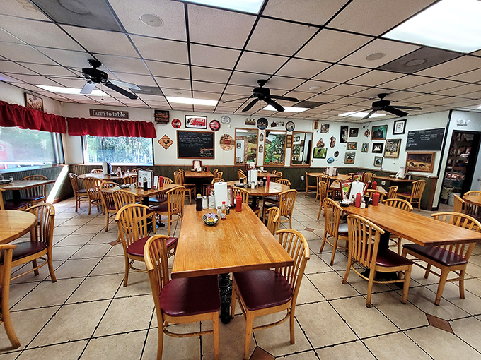 Classic wooden chairs and tables await hungry patrons in this no-frills dining room where conversations flow as freely as the coffee refills.