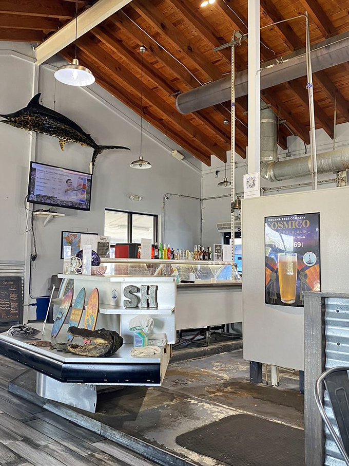 Exposed wooden beams, industrial lighting, and a marlin on the wall – the seafood equivalent of "I'm not trying to impress you, but I totally will."