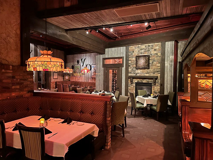 Step inside and time slows down. Tiffany-style lamps cast a warm glow over white tablecloths while stone fireplaces remind you: this is where memories are made.