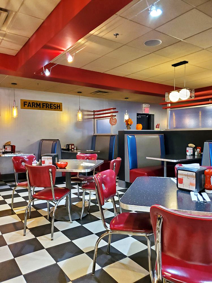 Classic diner aesthetics meet modern comfort inside. Those cherry-red vinyl booths aren't just Instagram-worthy&mdash;they're the perfect perch for pancake appreciation.