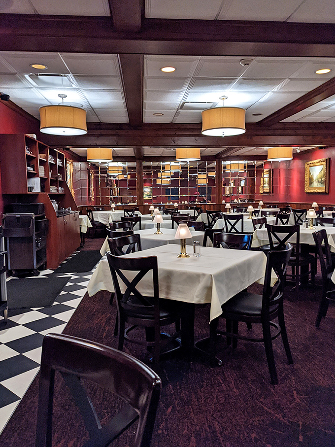 Classic steakhouse elegance: white tablecloths, warm lighting, and an atmosphere that whispers, "Your diet starts tomorrow."