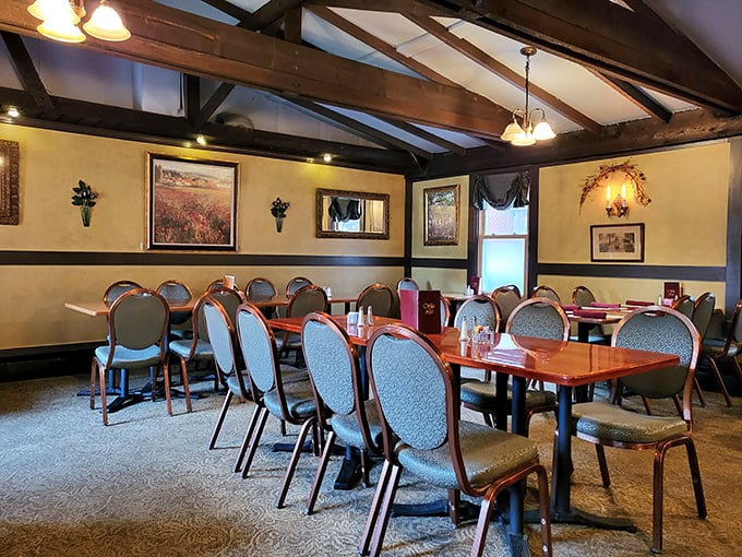 Exposed wooden beams frame this dining sanctuary where conversations have flowed as smoothly as the gravy for generations. History you can taste is served daily.