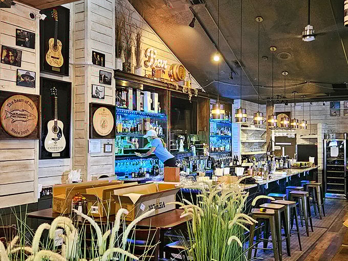 Guitar memorabilia meets coastal charm at the well-stocked bar. The perfect spot to sip something cold while debating which seafood treasure to order first.