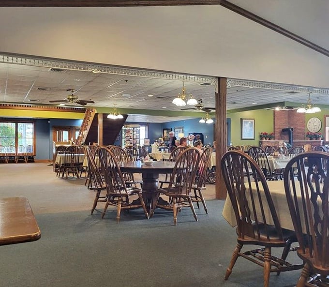 Windsor-back chairs and warm wood tones create that "grandma's dining room" feeling, only supersized for hundreds of hungry visitors.