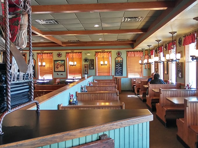 Inside, the turquoise and wood interior creates that perfect "grandma's kitchen meets Western saloon" vibe we all secretly crave.