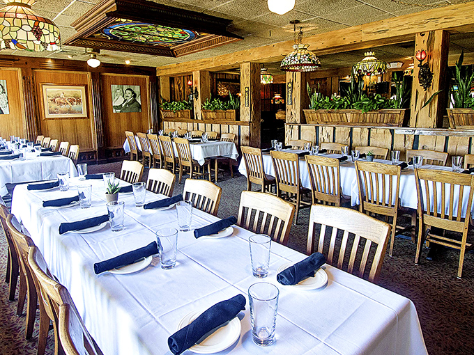 Step inside and time slows down &ndash; stained glass chandeliers cast a warm glow over white tablecloths, creating the perfect stage for the coming meat symphony.