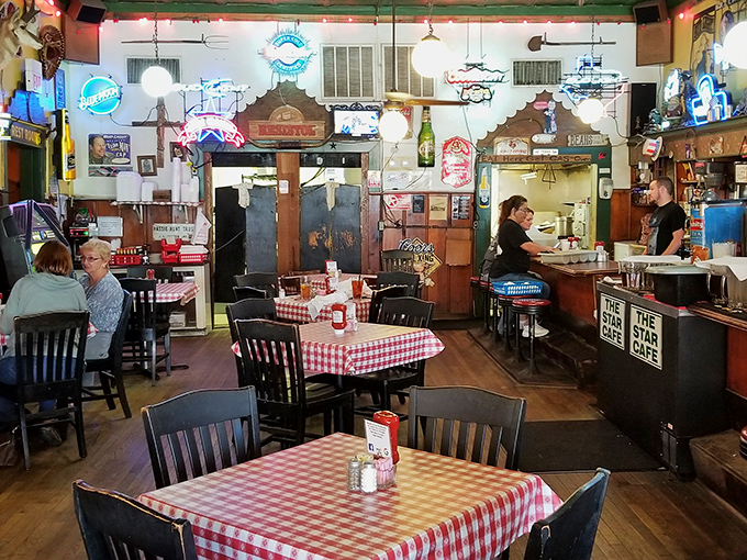 Red and white checkered tablecloths aren't just decoration&mdash;they're a promise that what you're about to eat will taste like childhood memories, only better.