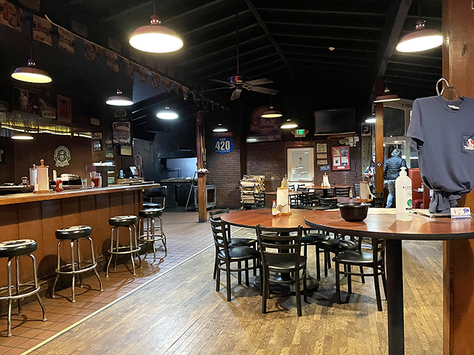 Inside, wooden floors and pendant lighting create that perfect "serious about barbecue but not too fancy to lick your fingers" atmosphere.