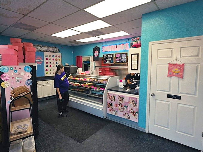 Step inside and the vibrant turquoise walls frame what really matters: display cases filled with edible art that would make Picasso jealous.