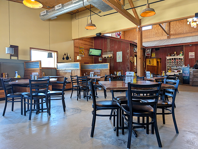 Inside, rustic meets refined with wooden beams, concrete floors, and just enough country charm to remind you that great food doesn't need fancy surroundings.