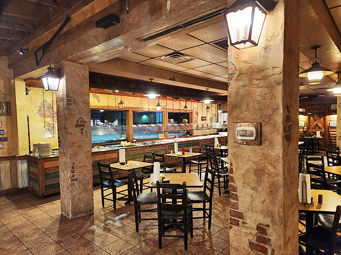 Stone columns and rustic charm set the stage for culinary drama, where every meal feels like you've been invited to a Cajun family reunion.