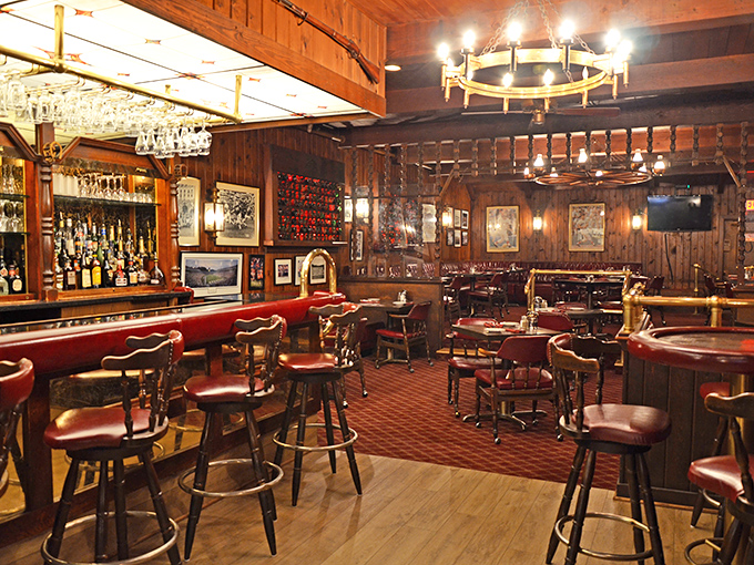 Step inside and time stands still. Wood-paneled walls, wagon wheel chandeliers, and red leather stools create the steakhouse atmosphere dreams are made of.