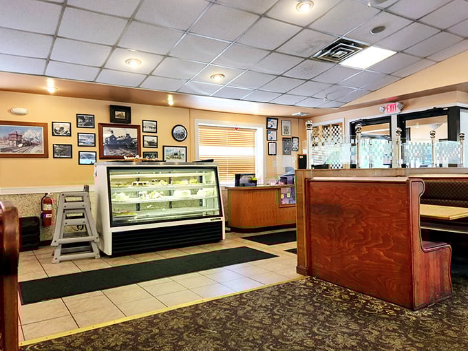 Yellow walls adorned with local memorabilia create that "everybody knows your name" atmosphere that chain restaurants spend millions trying to replicate.