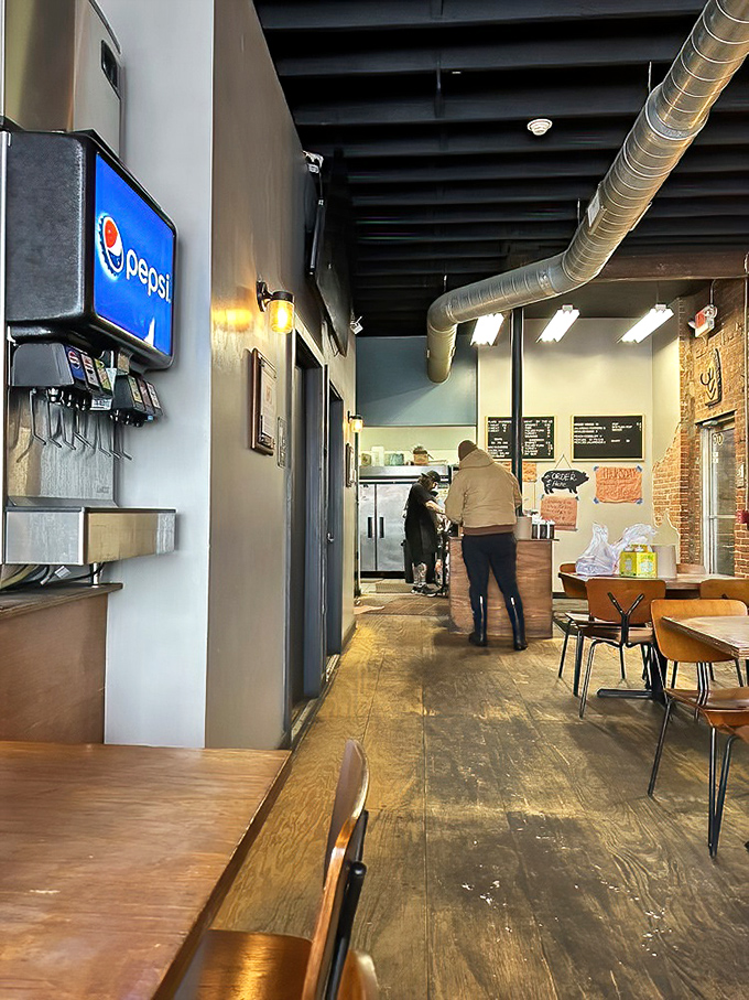 The pilgrimage to meat nirvana begins here. Simple interiors with exposed ductwork set the stage for barbecue that's anything but basic.