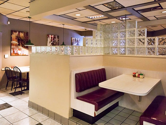 Those burgundy vinyl booths and glass block dividers aren't just retro&mdash;they're time machines to when conversations happened without phones.