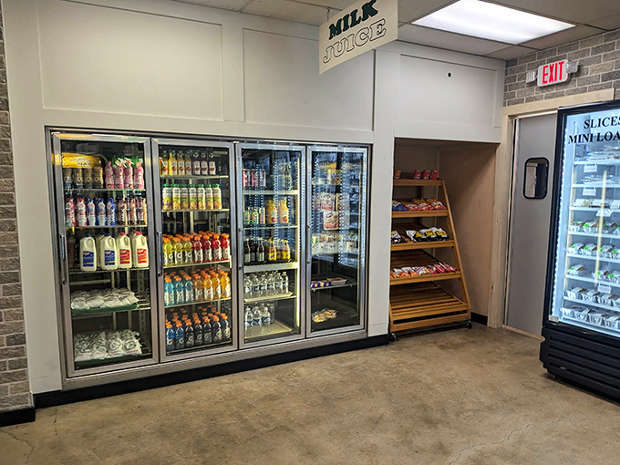 Those refrigerated cases aren't just storing milk—they're keeping beverages perfectly chilled for washing down all the pastries you're about to devour.