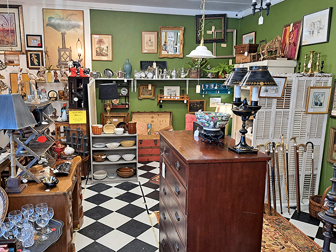 Each vendor booth creates its own little world&mdash;this one with its checkerboard floor and green walls feels like stepping into your stylish grandmother's dream kitchen.
