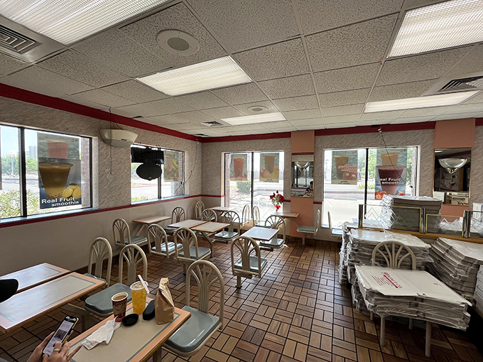 No-frills interior with a purpose: every square inch dedicated to the serious business of donut and breakfast sandwich perfection.