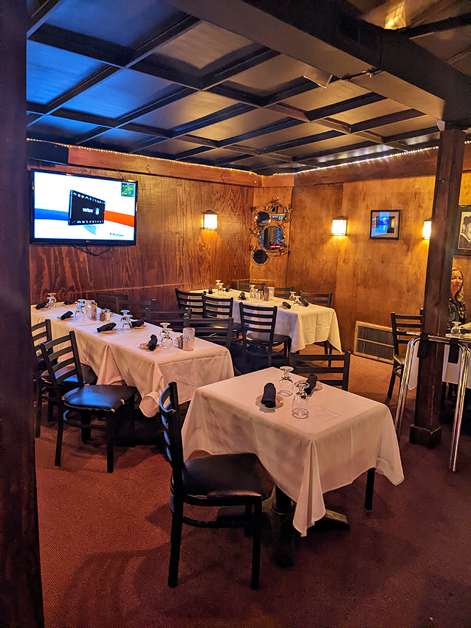 Wood-paneled walls, white tablecloths, and just the right lighting&mdash;this dining room wasn't designed for Instagram, but for serious steak appreciation.