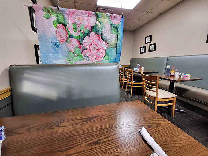 Inside, floral tapestries and wood-paneled booths create that perfect "come as you are" vibe where comfort trumps trendiness every time.