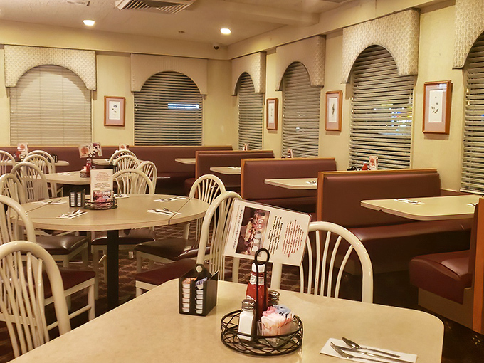 Inside, burgundy booths and arched windows create that perfect diner atmosphere&mdash;where conversations flow as freely as the coffee refills.